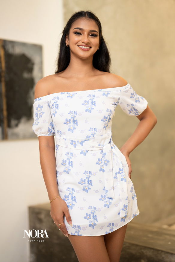 Buy elegant floral printed off shoulder waist band dress at Nora Reed